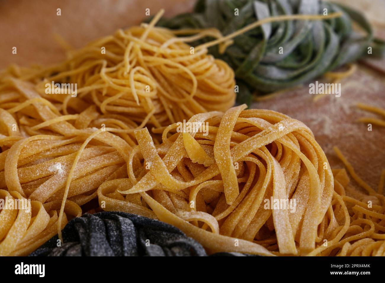 Cooking traditional Italian tagliatelle pasta Stock Photo - Alamy