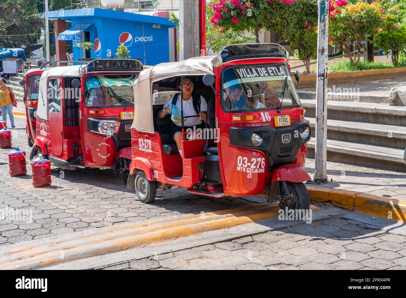 Auto taxis line up for passengers in Villa de Etla in the Central ...