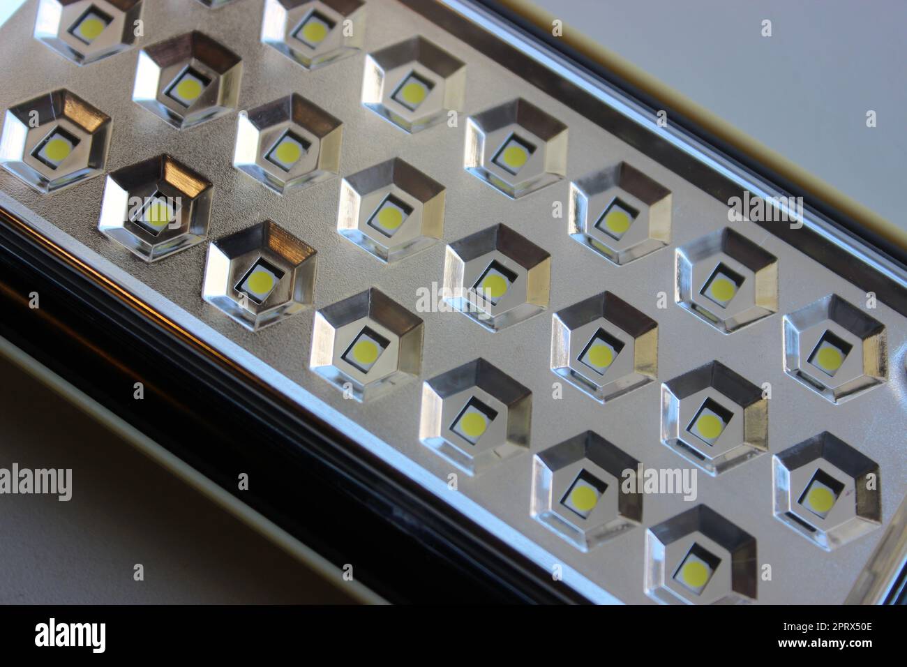 Pattern of LED light diodes in a rows on mirror panel for backlight ...
