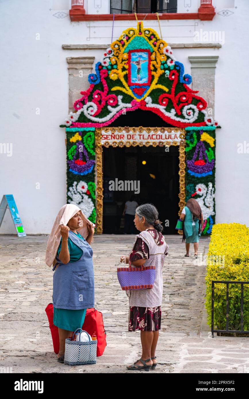 Indigenous Zapotec women in traditional dress in front of the church in ...