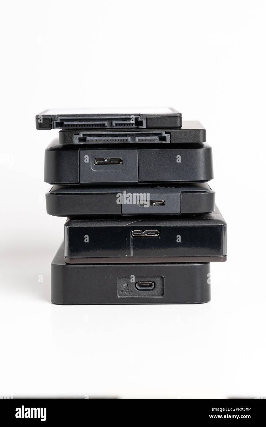A stack of external USB hard drives on a white background Stock Photo ...
