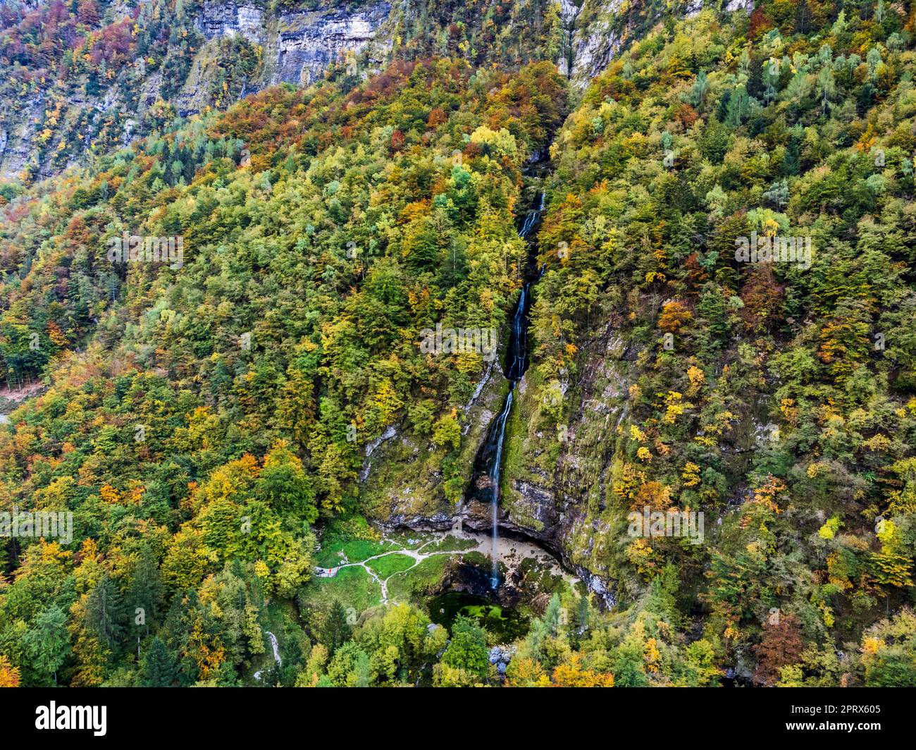Autumn on the Karst waterfall of Fontanon di Goriuda. View from above ...