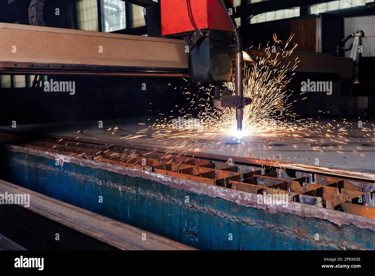Plasma cutting of metal with a cnc. Plasma cutting machine cutting ...