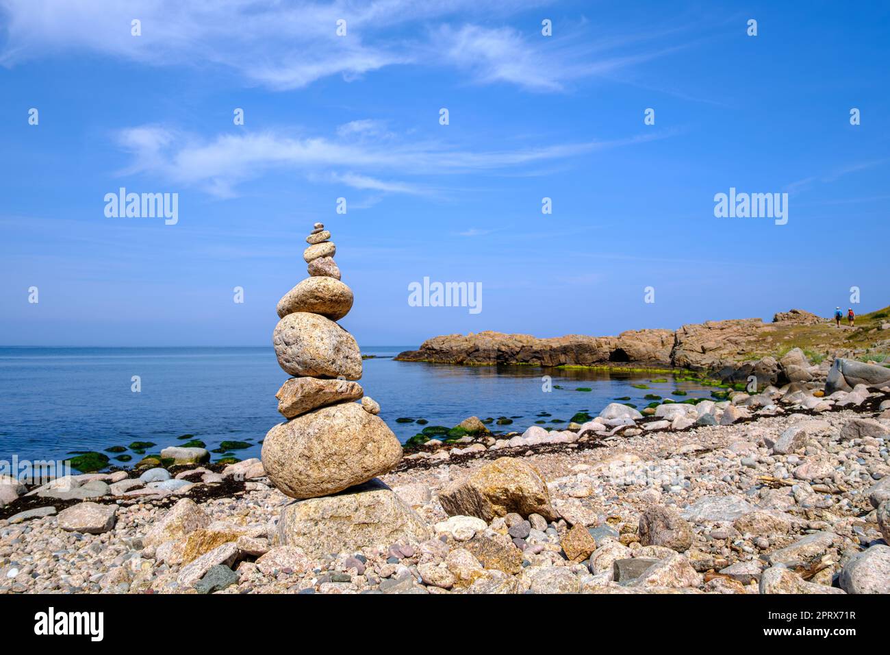 Stone pyramid on the section of the west coast of Hammeren headland at ...