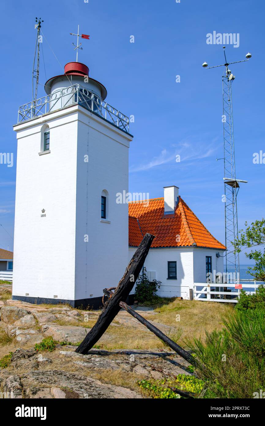 Hammer Odde Lighthouse at the northern tip of Bornholm Island, Denmark ...
