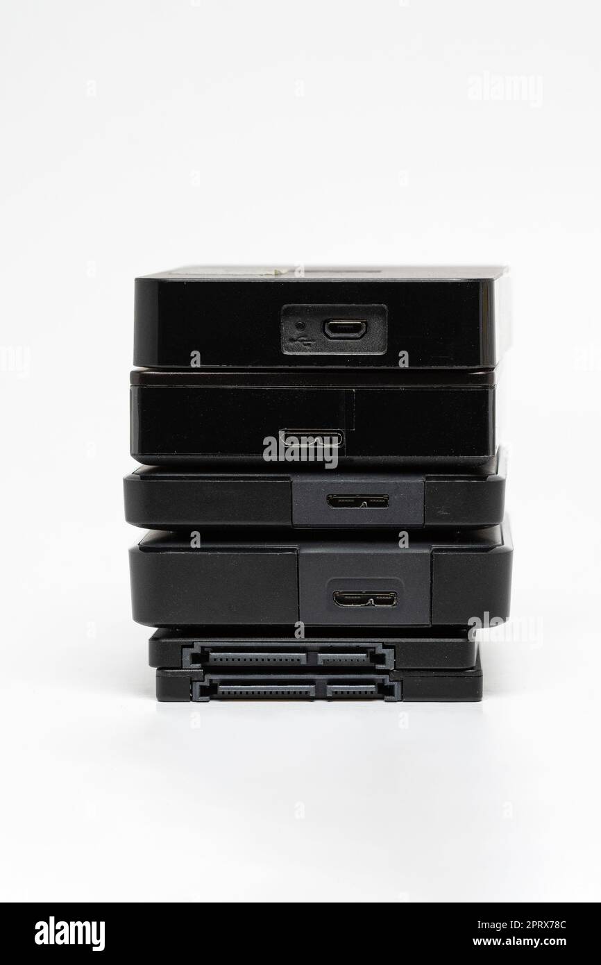 A stack of external USB hard drives on a white background Stock Photo ...
