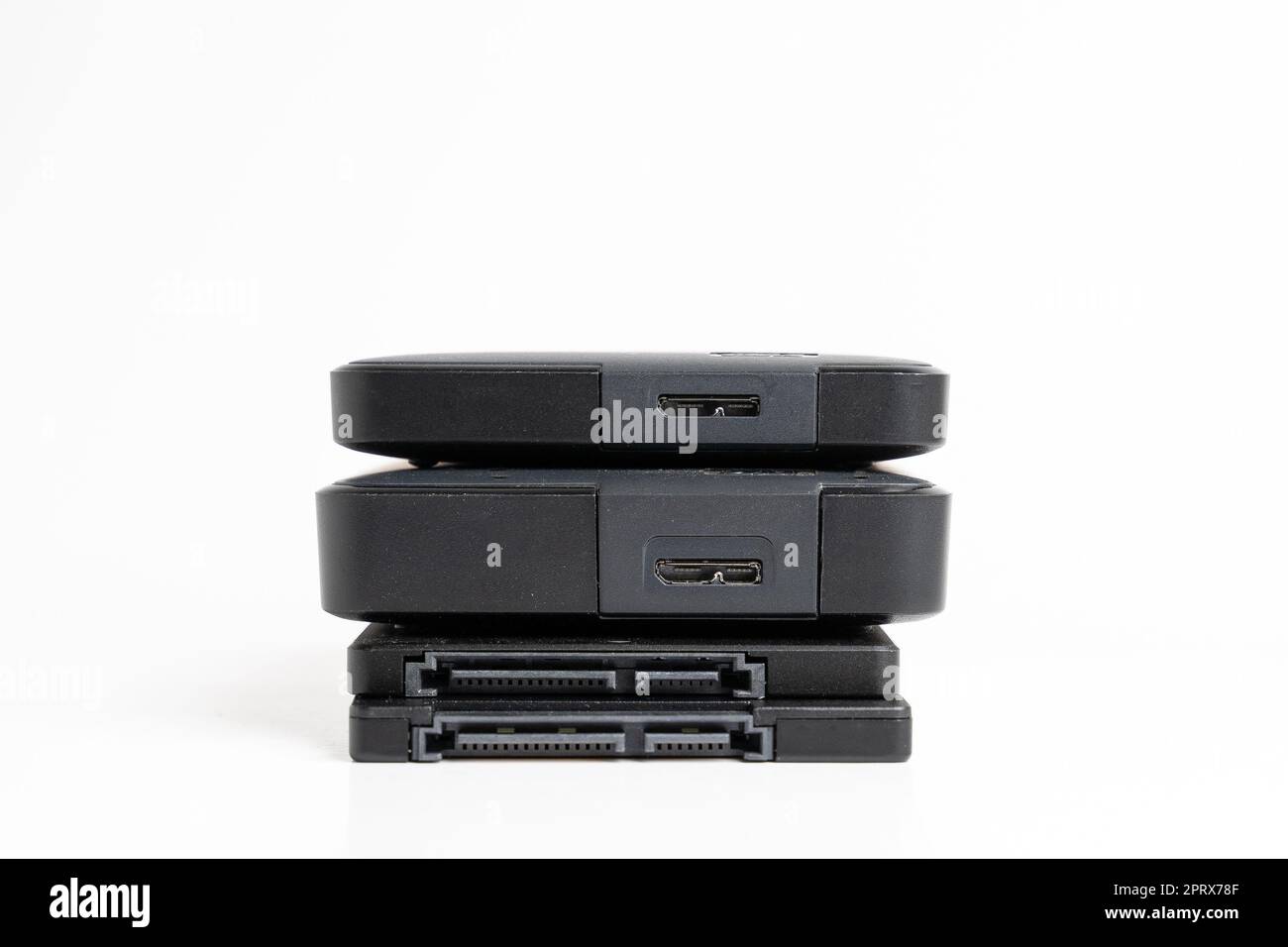 A stack of external USB hard drives on a white background Stock Photo ...