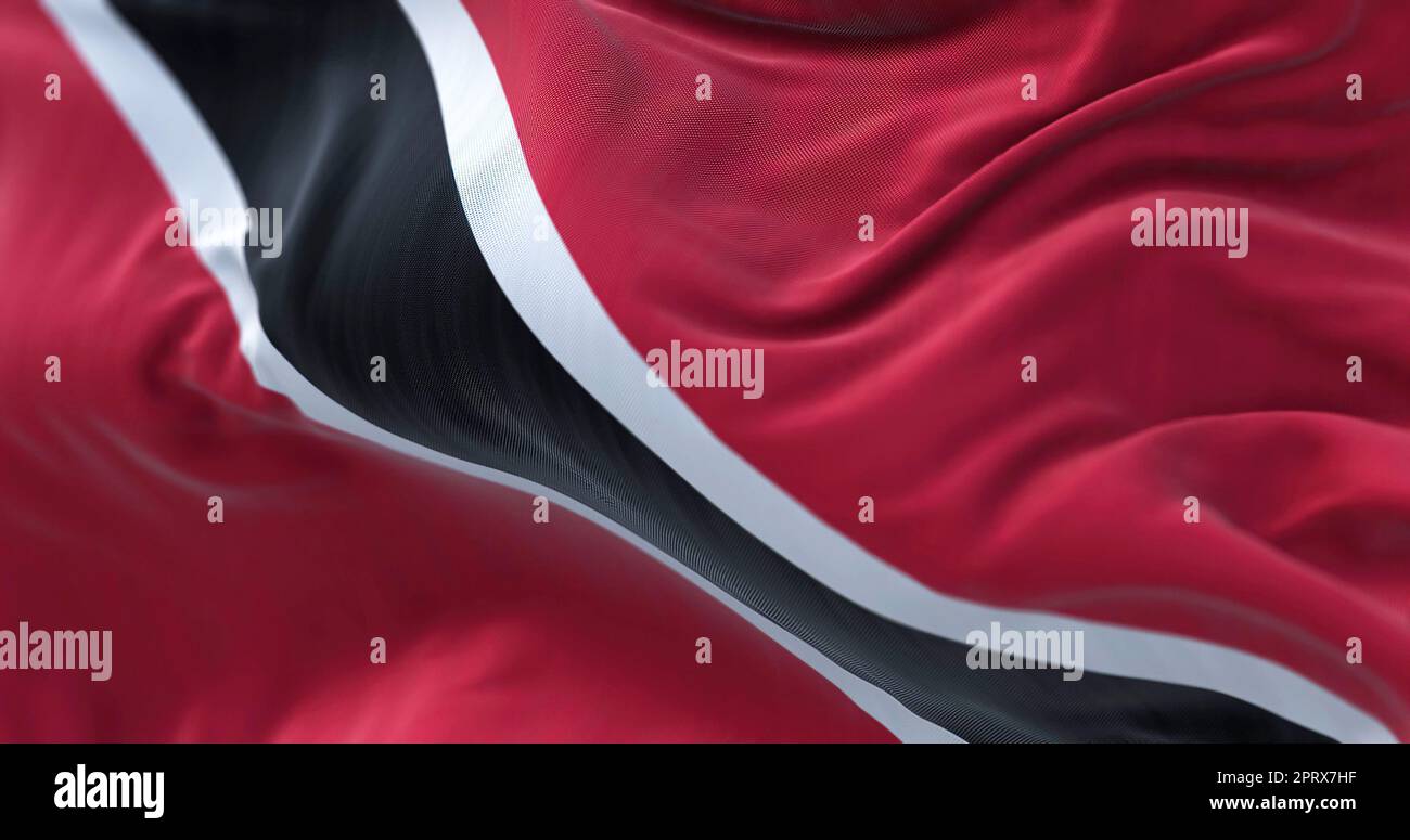 Close-up view of Trinidad and Tobago national flag waving. The Republic of Trinidad and Tobago ...