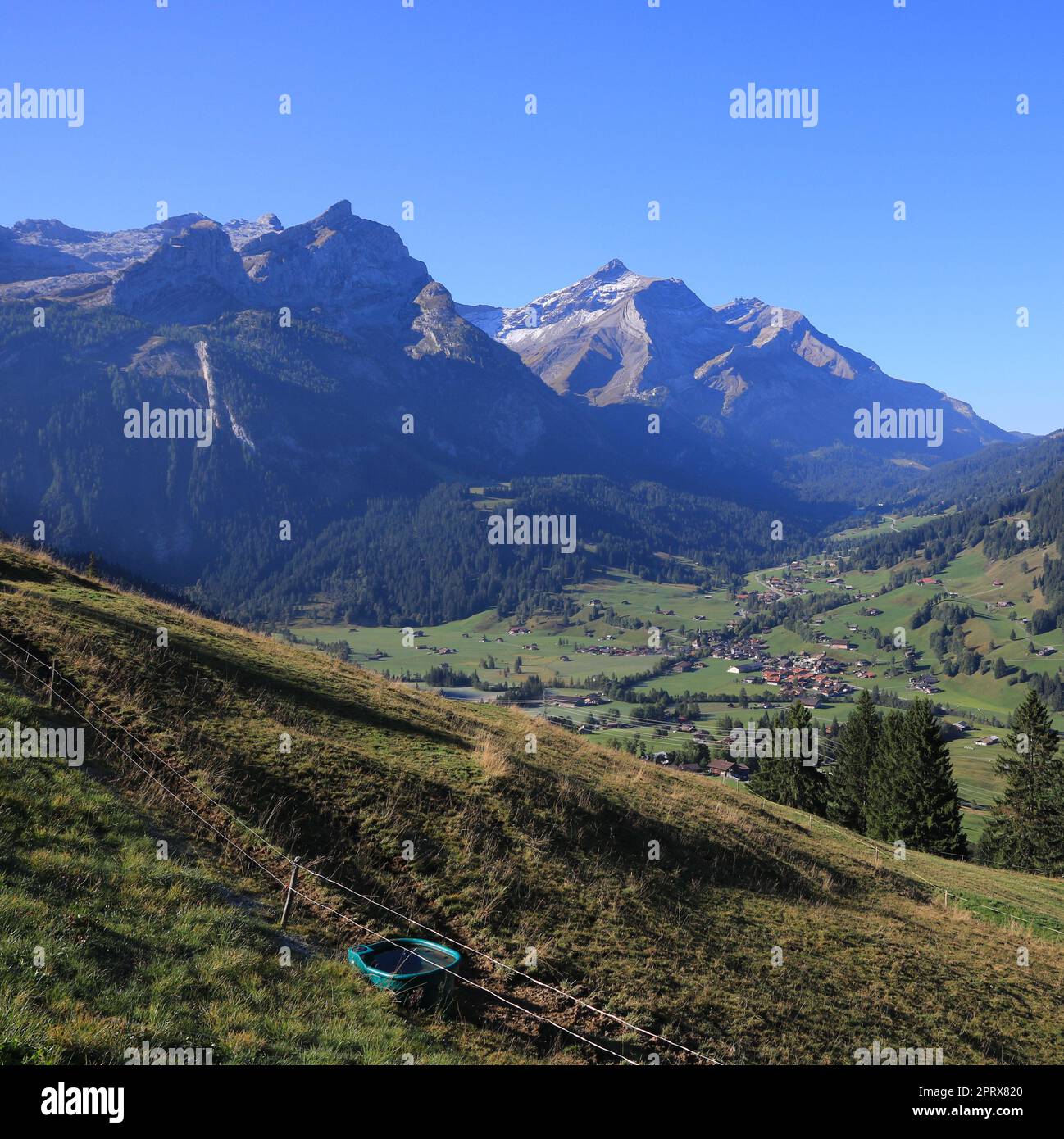 Village Gsteig Bei Gstaad and high mountains Stock Photo - Alamy