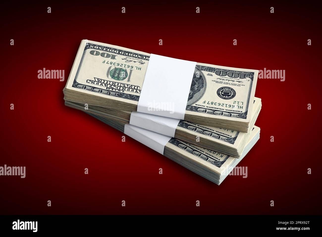 Bundle of US dollar bills on crimson red background. Pack of american ...
