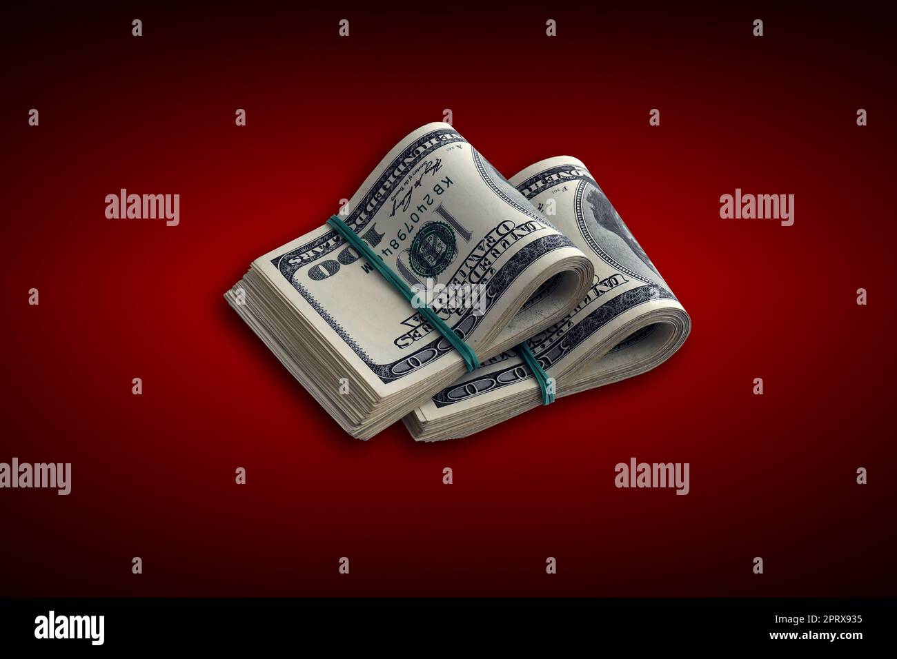 Bundle of US dollar bills on crimson red background. Pack of american ...