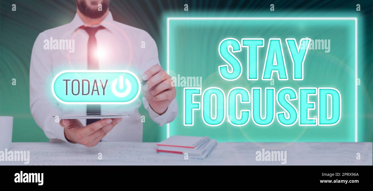 Sign displaying Stay Focused, Business idea Be attentive Concentrate Prioritize the task Avoid ...