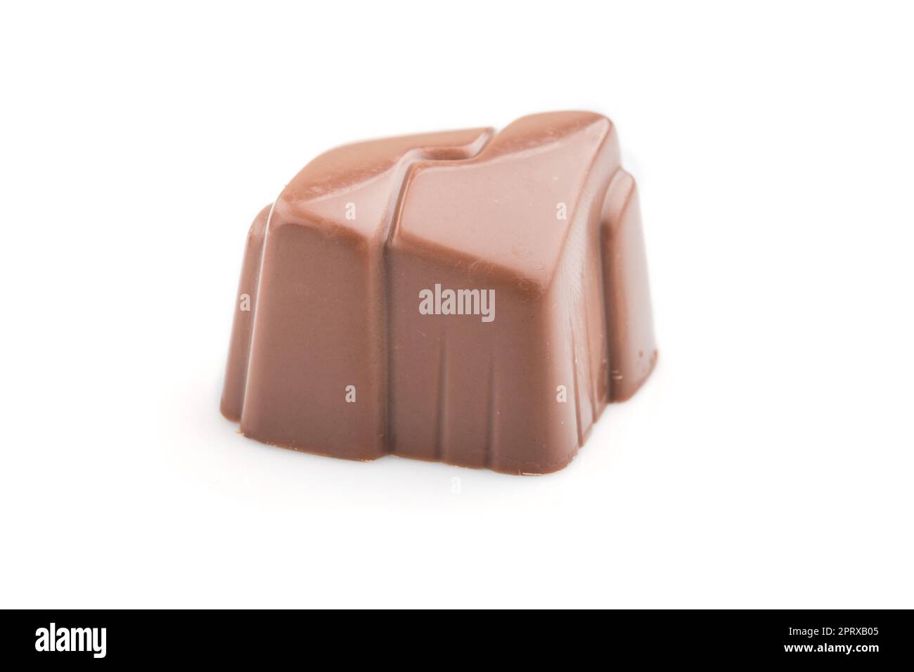Single chocolate candy isolated on white background. side view, close ...