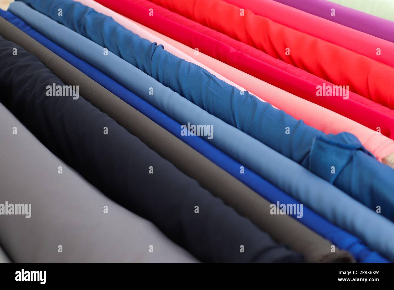 Samples of cloth and fabrics in different colors found at a fabrics ...