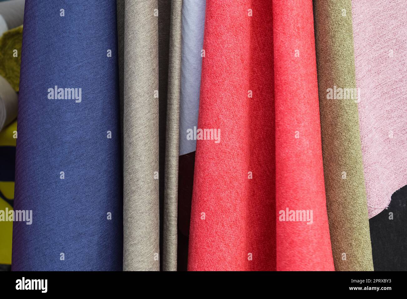 Samples of cloth and fabrics in different colors found at a fabrics ...