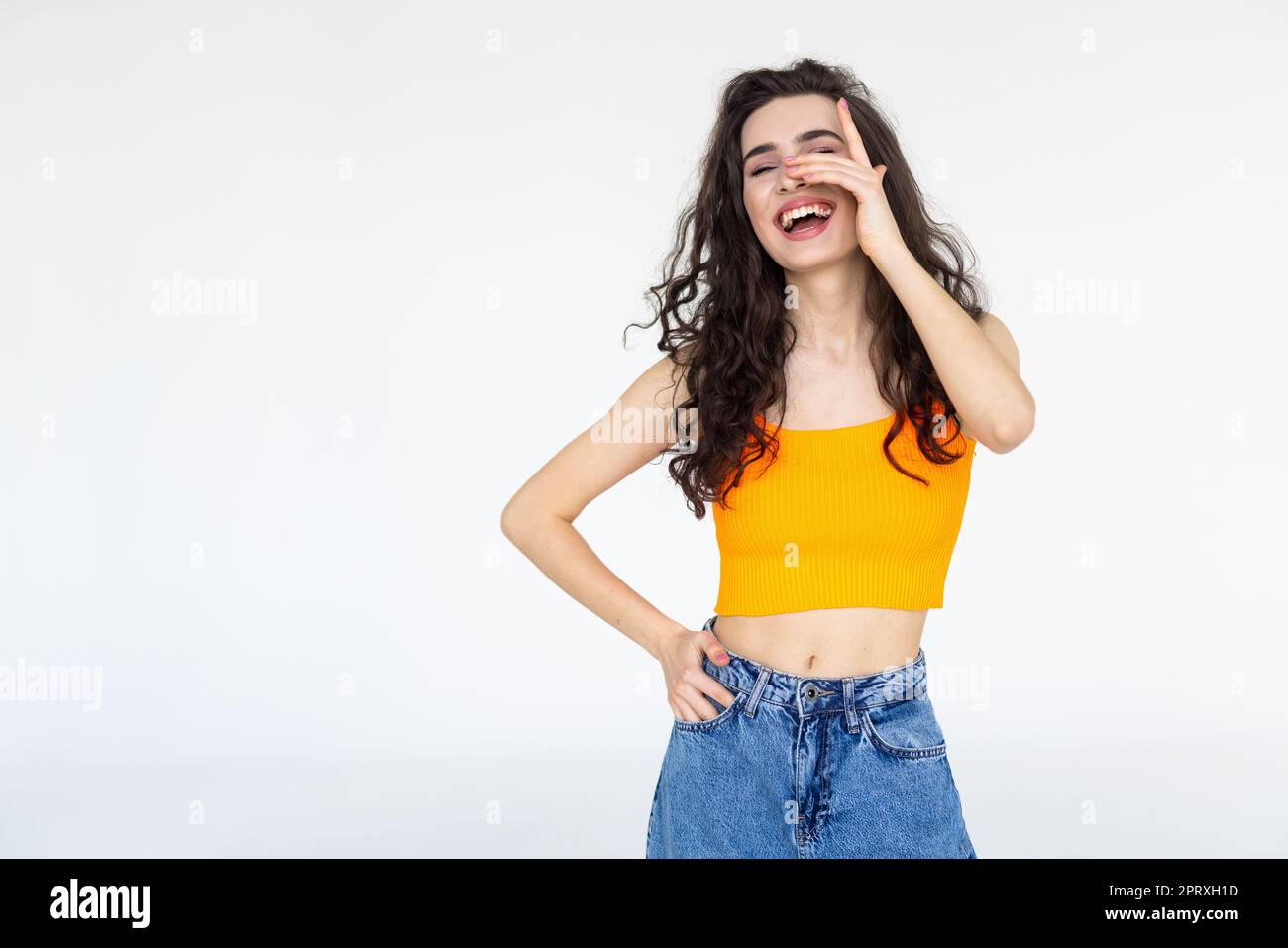 Finally. Relieved and happy young woman scream from success and triumph ...