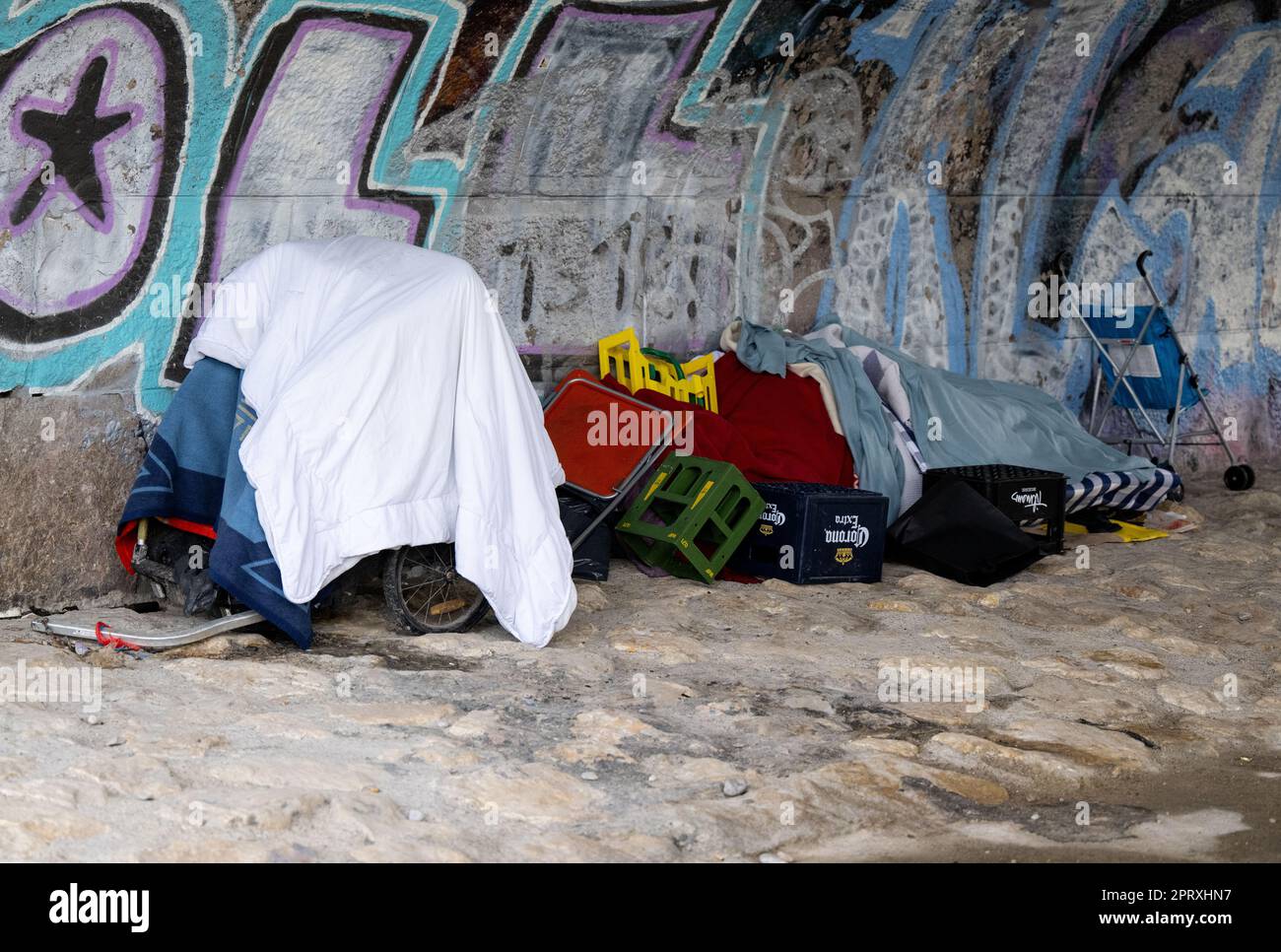 Munich, Germany. 27th Apr, 2023. The belongings of a homeless man lie ...