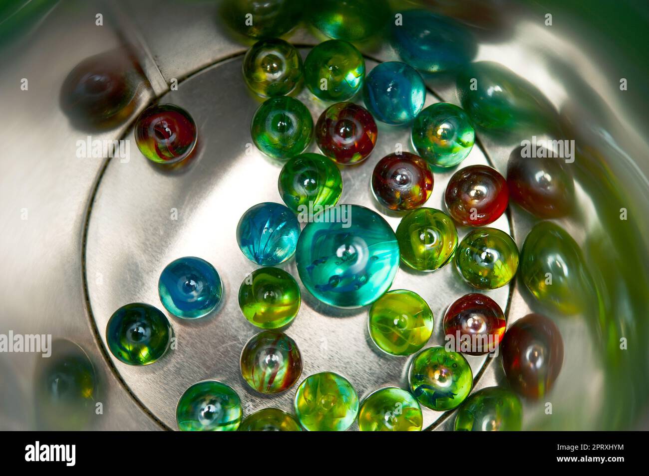 metal container and glass spheres Stock Photo - Alamy