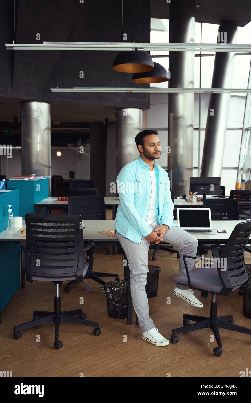 Man waiting for colleagues at work in the office Stock Photo - Alamy
