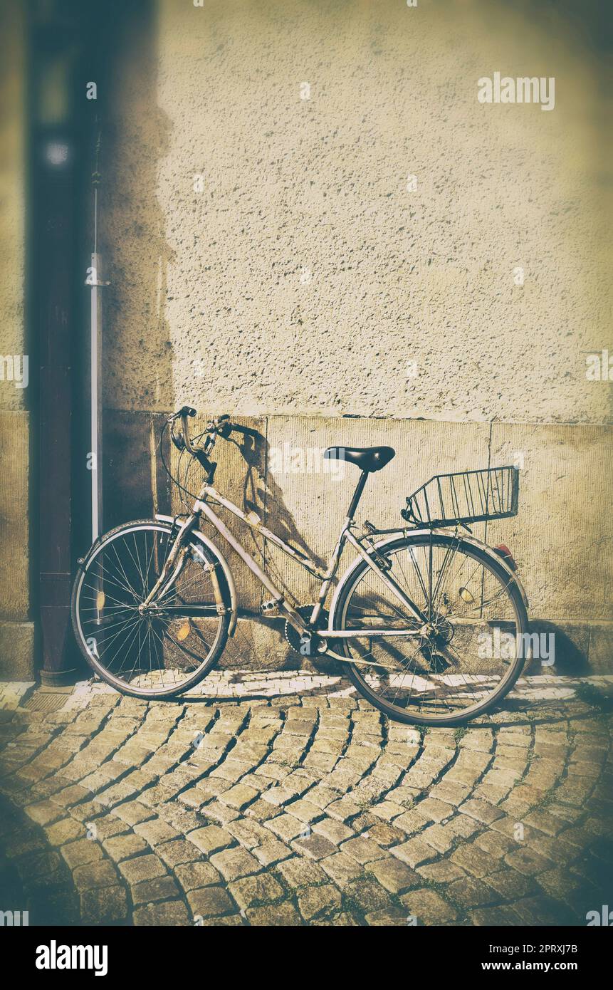 vintage bicycle against a wall, blur vignette effect Stock Photo - Alamy