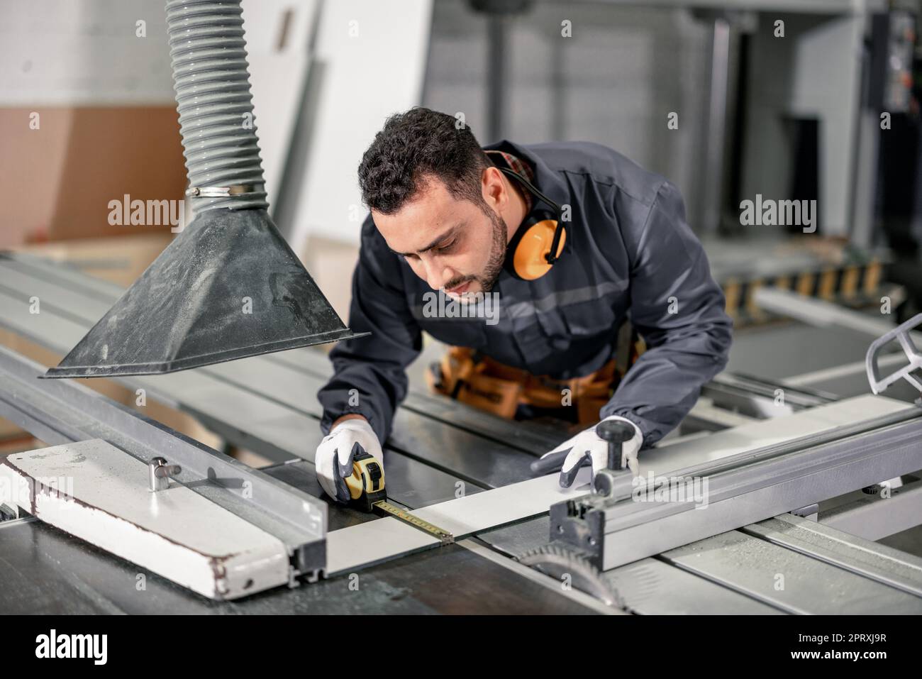 Wood turners measure and calculate the right size of workpiece ...