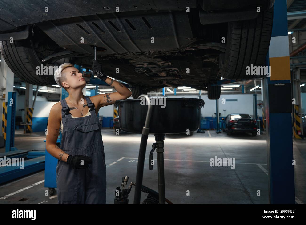 Professional mechanical employee car hi-res stock photography and ...
