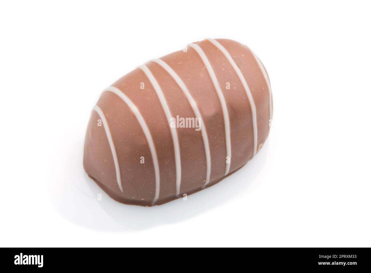 Single chocolate candy isolated on white background. side view, close ...
