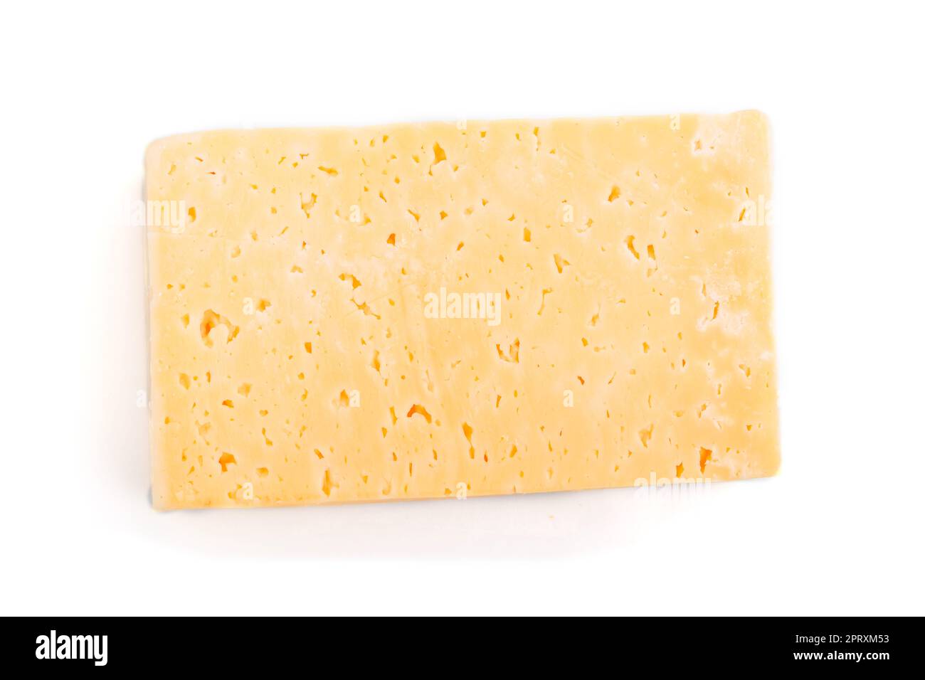 Piece of yellow cheese isolated on white background. Top view, close up ...