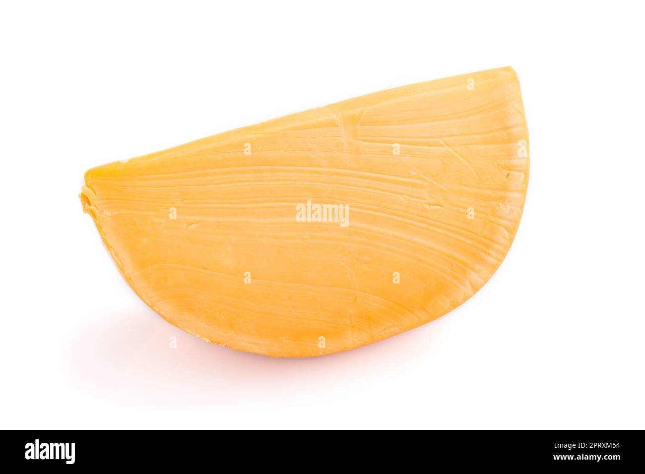 Piece of orange cheese isolated on white background. Side view, close ...