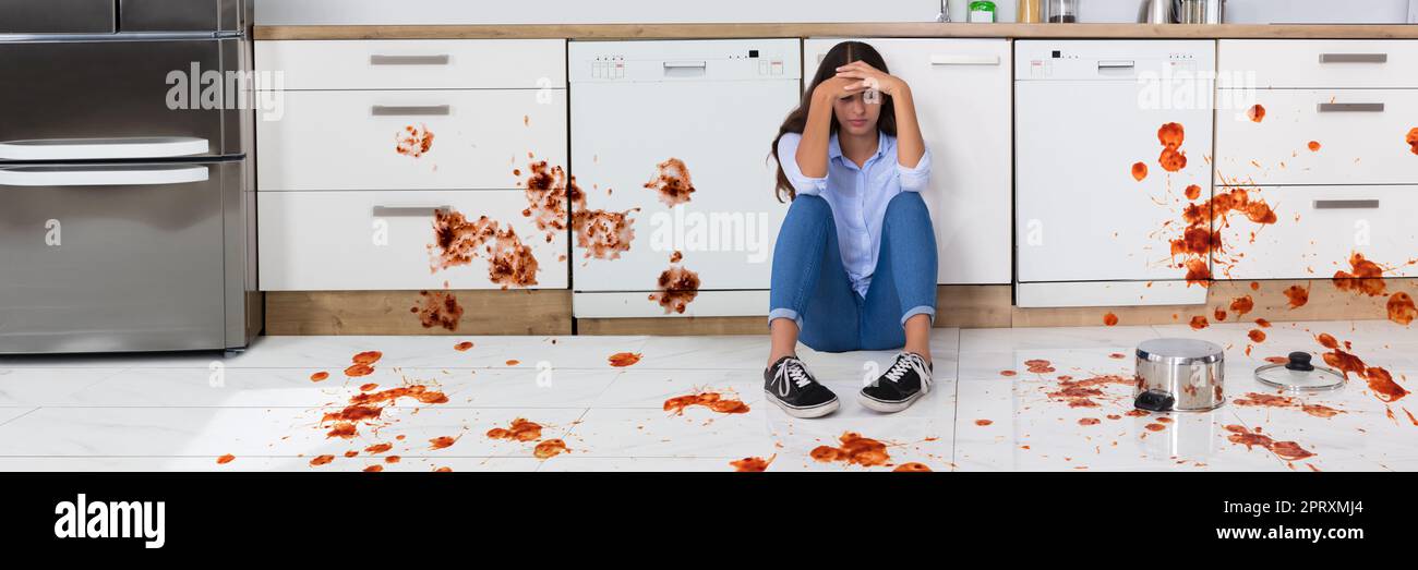 Messy Kitchen Floor Spill. Spilled Food Accident Mess Stock Photo - Alamy
