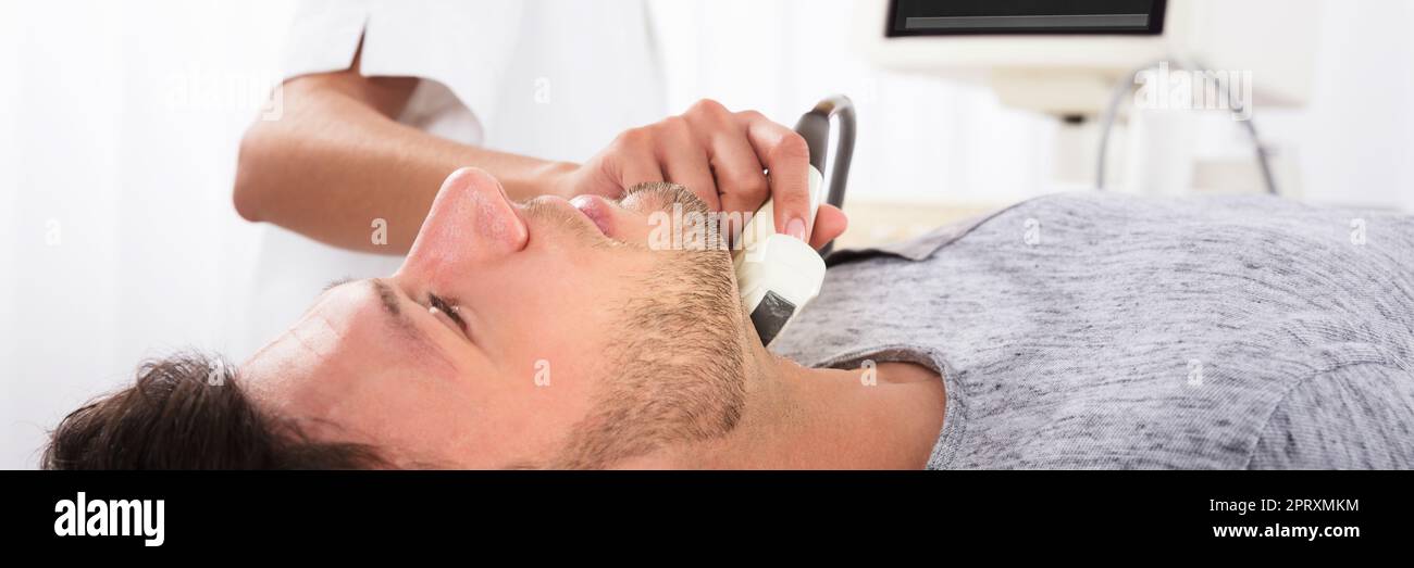 Doctor Checking Thyroid Neck With Ultrasound. Ultrasonography Machine ...
