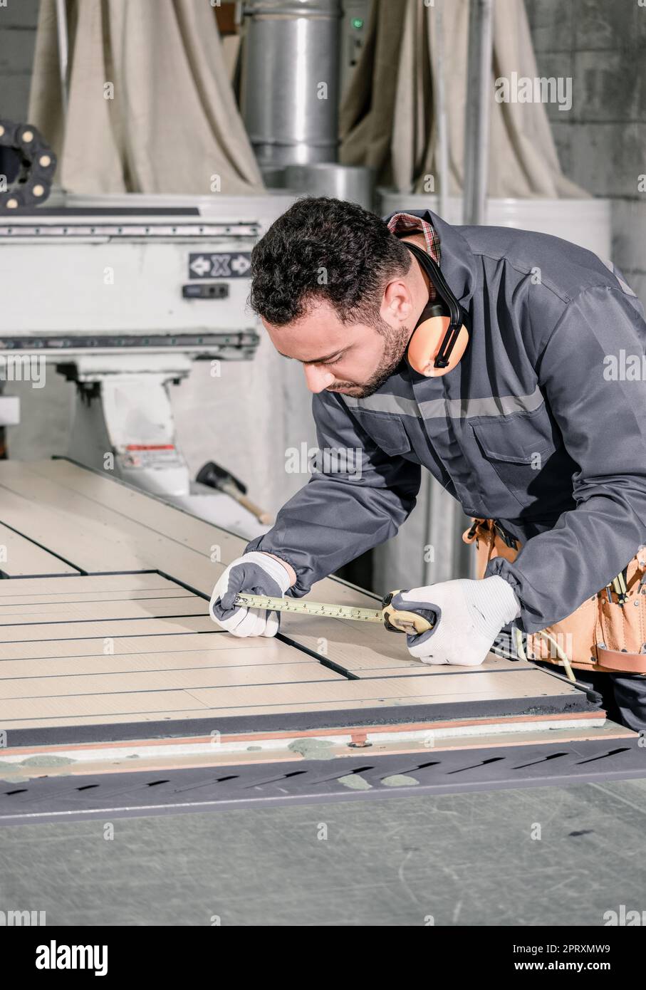 Wood turners measure and calculate the right size of workpiece ...