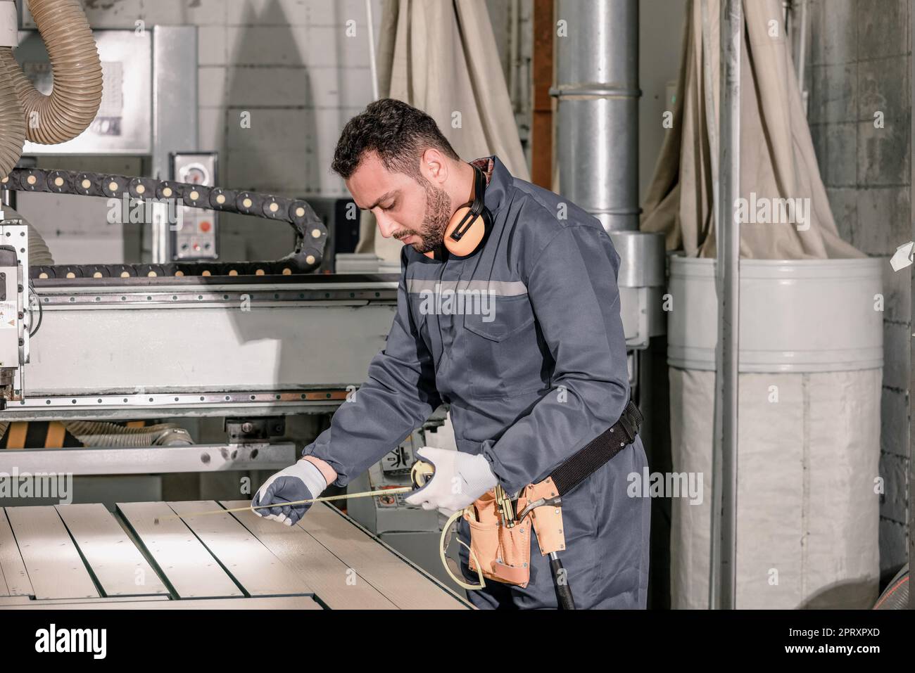 Wood turners measure and calculate the right size of workpiece ...