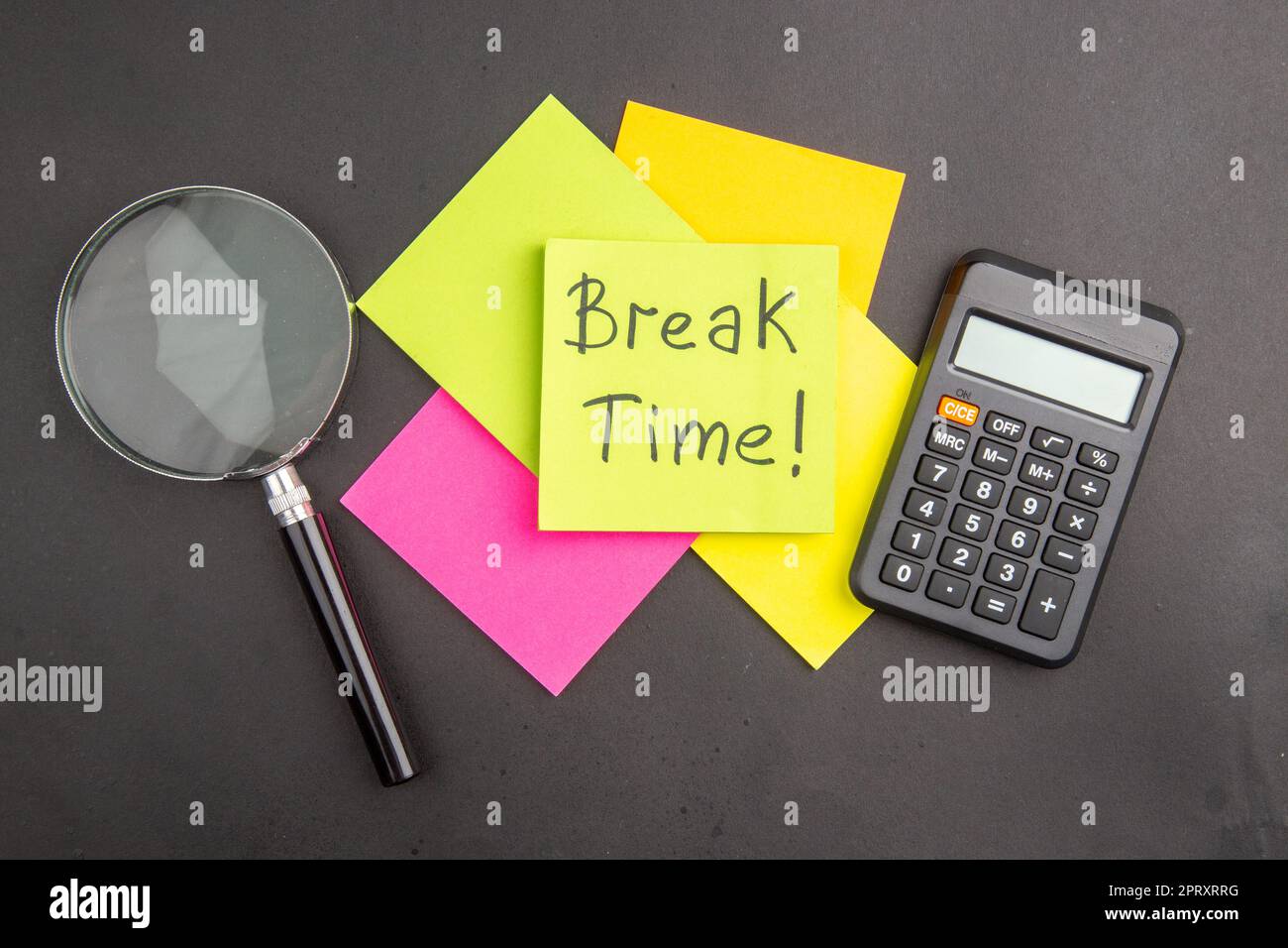 top view break time written on yellow sticky note colorful sticky notes ...