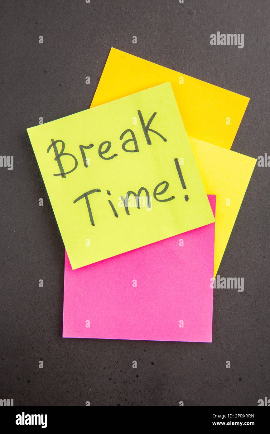 top view break time written on yellow sticky note colorful sticky notes ...