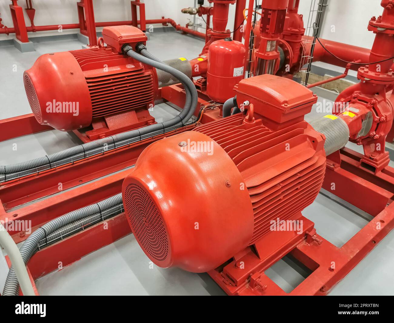 View at industrial electrically powered water pumps and pipes, this ...