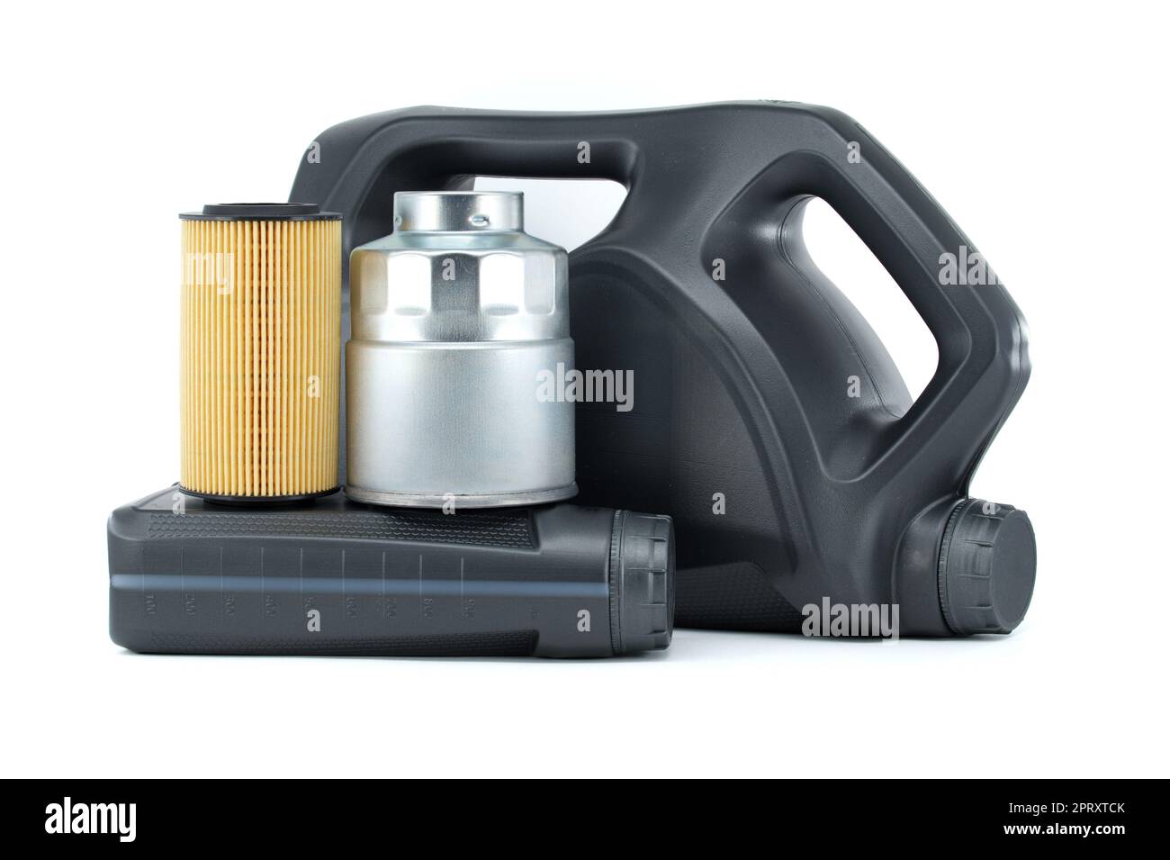Vehicle engine oil filters and motor oil cans isolated on a white ...