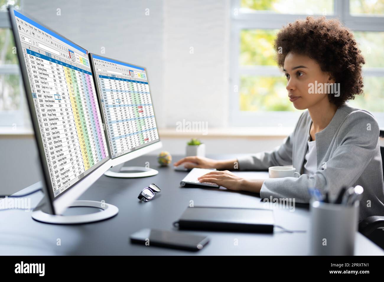 Medical Coding Spreadsheet On PC. African Woman In Wheelchair Stock ...