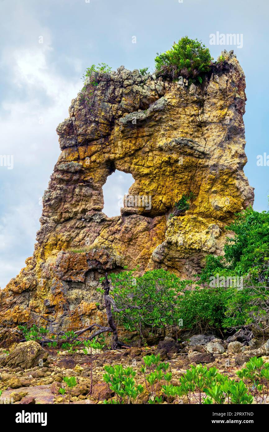Rock called Window of Heaven at Pulau Mawar coast. Endau, West Malaysia ...
