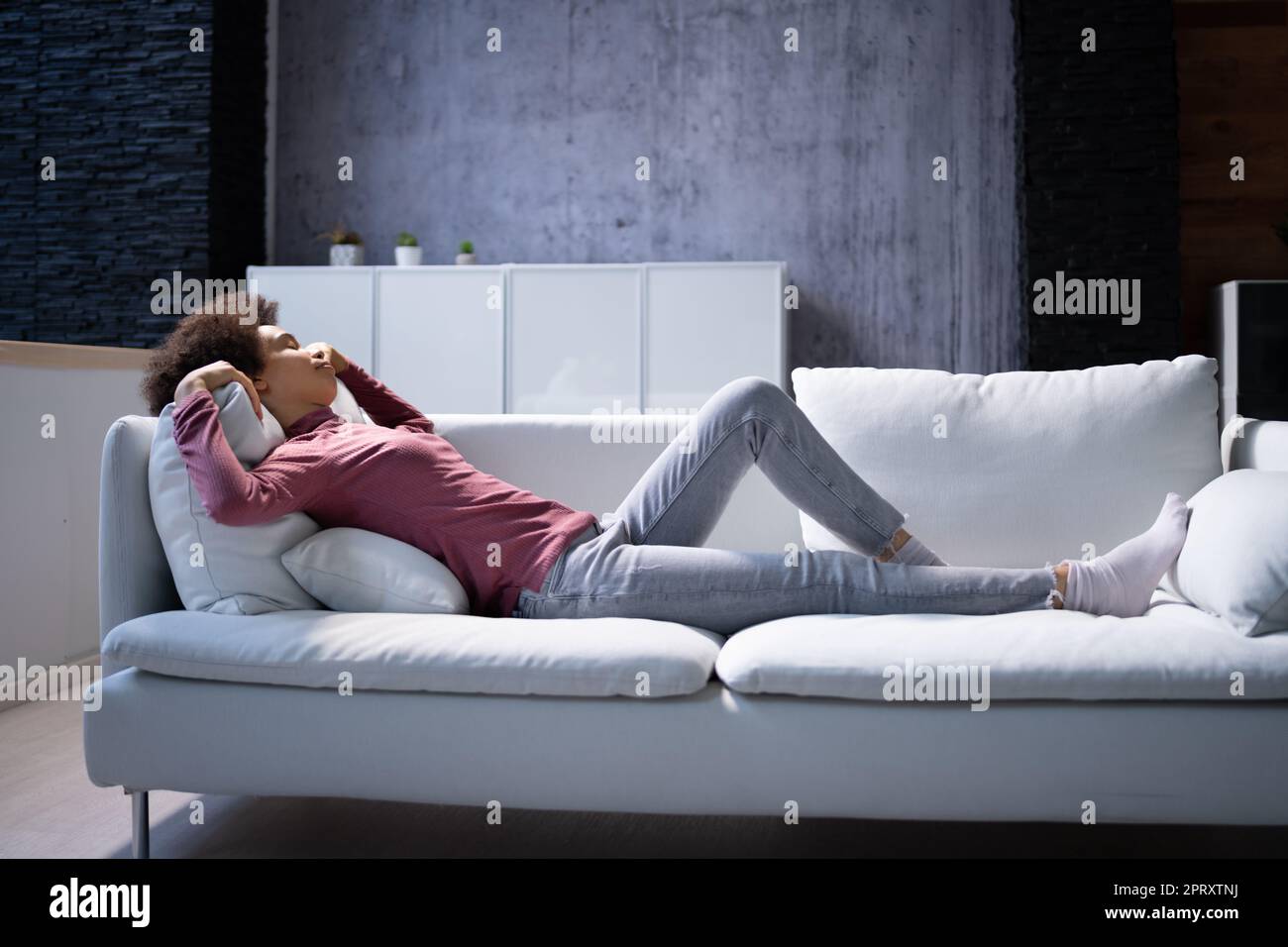 Lazy Woman Sleeping On Couch Or Sofa Stock Photo - Alamy