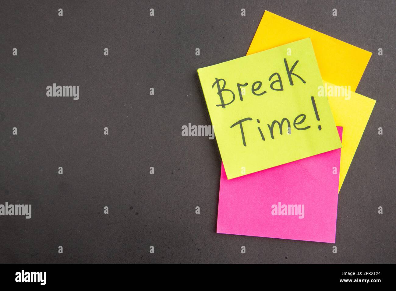 top view break time written on yellow sticky note colorful sticky notes ...