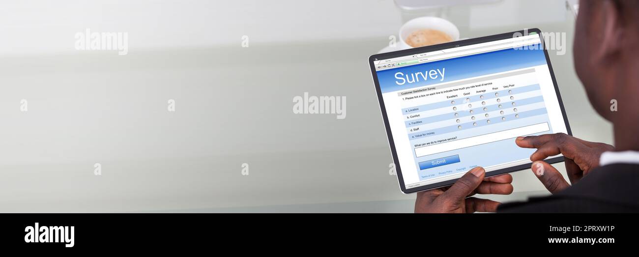 Online Questionnaire Survey Form Fill On Tablet Stock Photo - Alamy