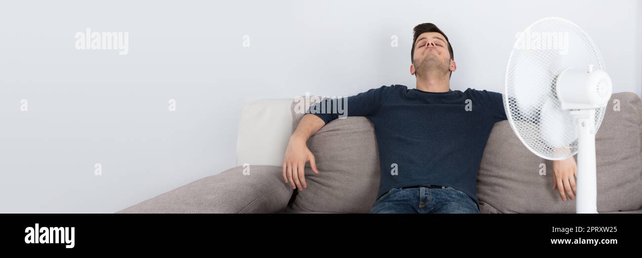Ventilator Fan At Home. Cool Wind And Hot Weather Stock Photo - Alamy
