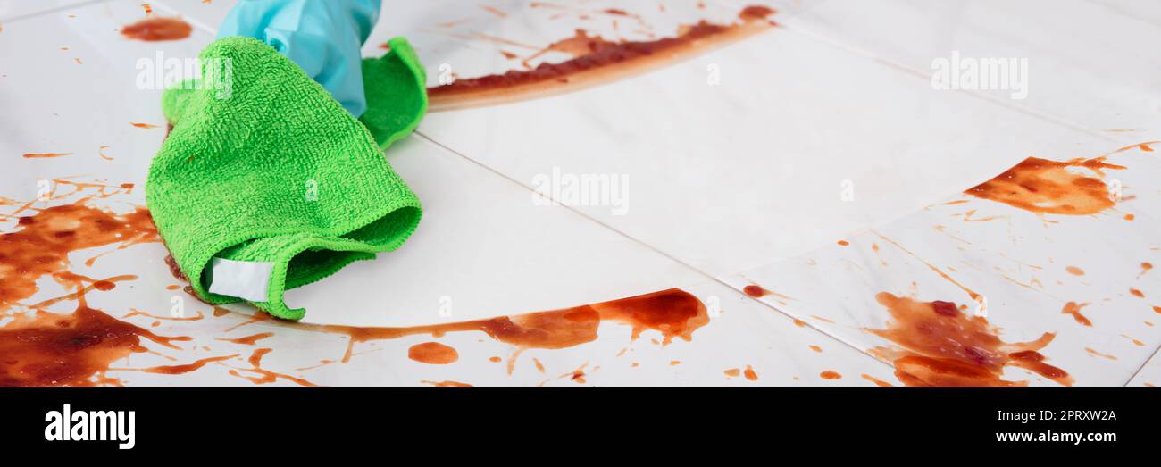 Cleaning Dirty Floor Stain. Person Hand Cleaning Spilled Food Stock ...