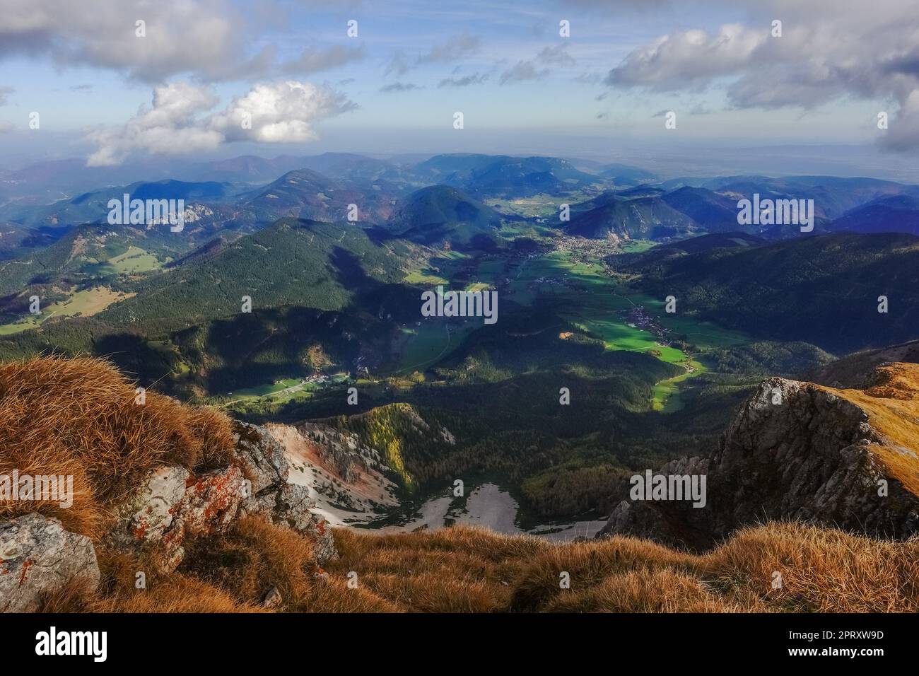 amazing wide view to a hilly mountain landscape and amazing sky during ...