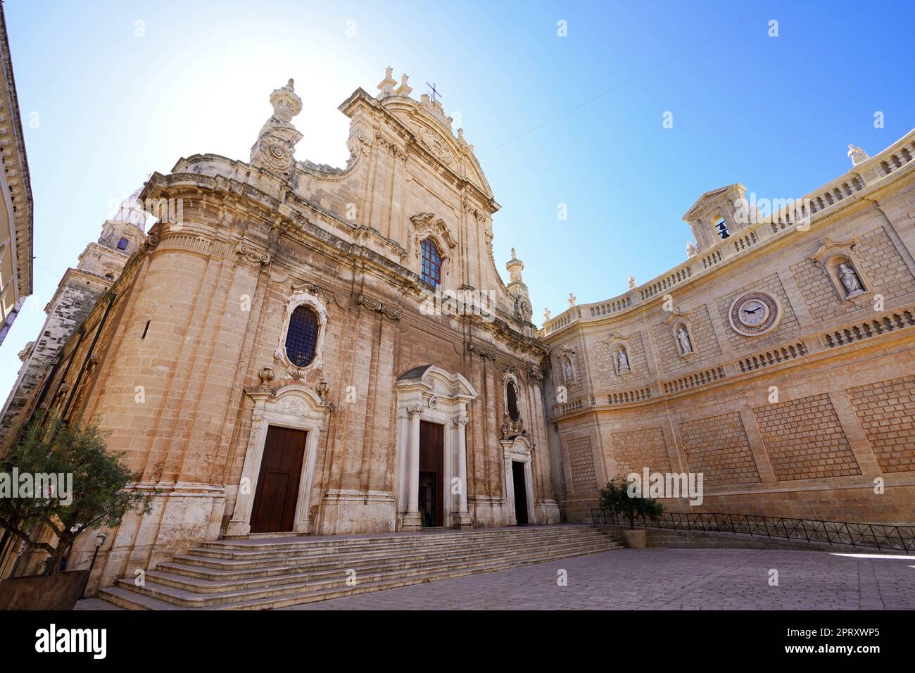Monopoli Cathedral with historic wall of the city, Apulia, Italy. Wide ...