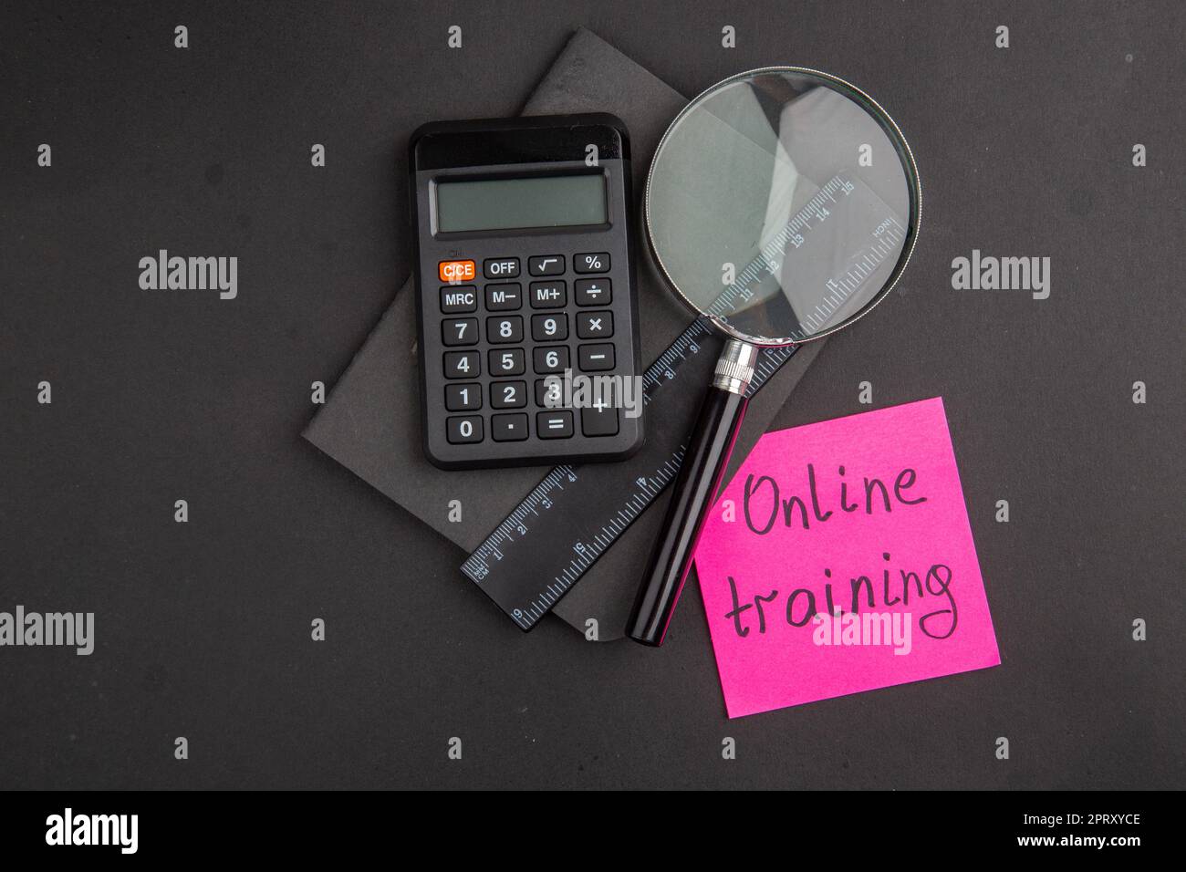 top view online training written on sticky notes pen ruler lupa ...