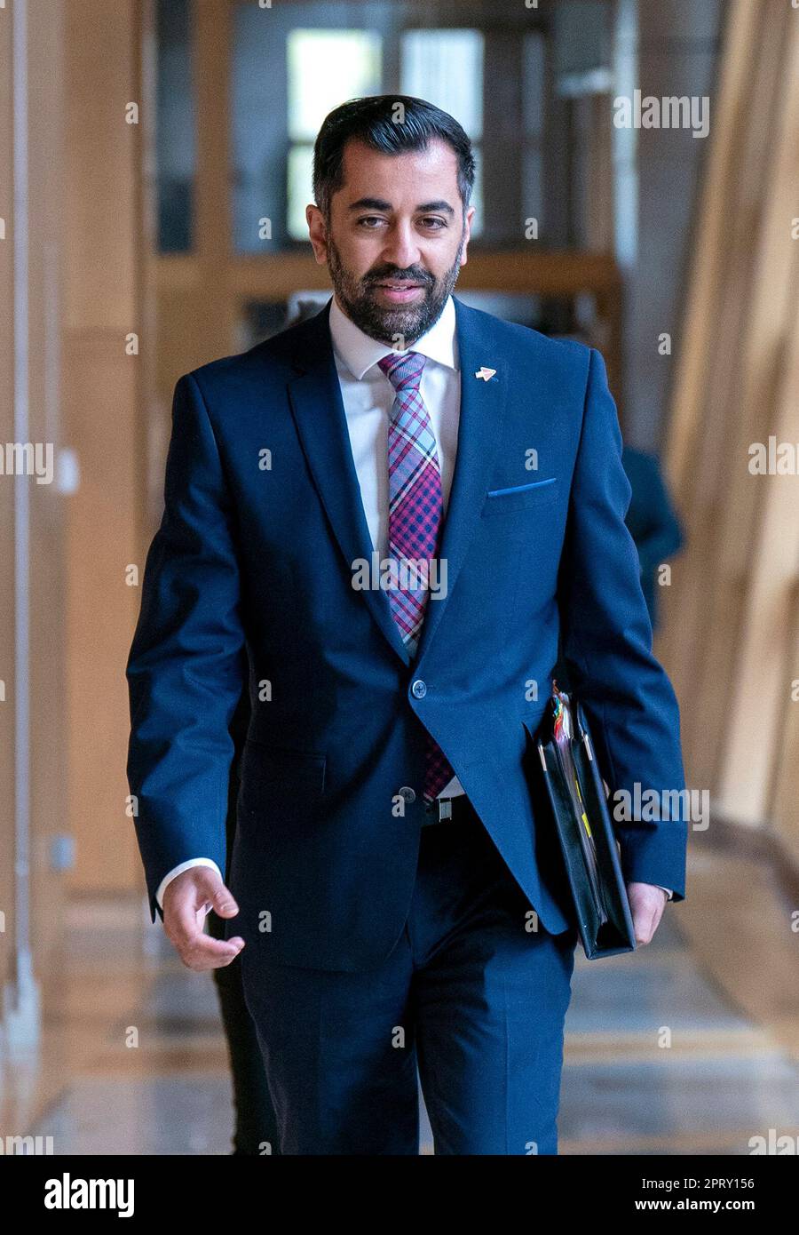 Scotland's First Minister Humza Yousaf arrives at the main chamber ...