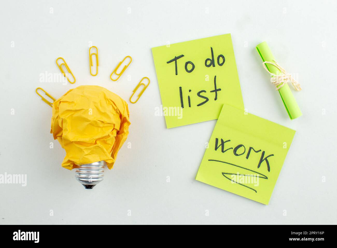 top view to do list and work written on sticky notes idealight bulb gem ...