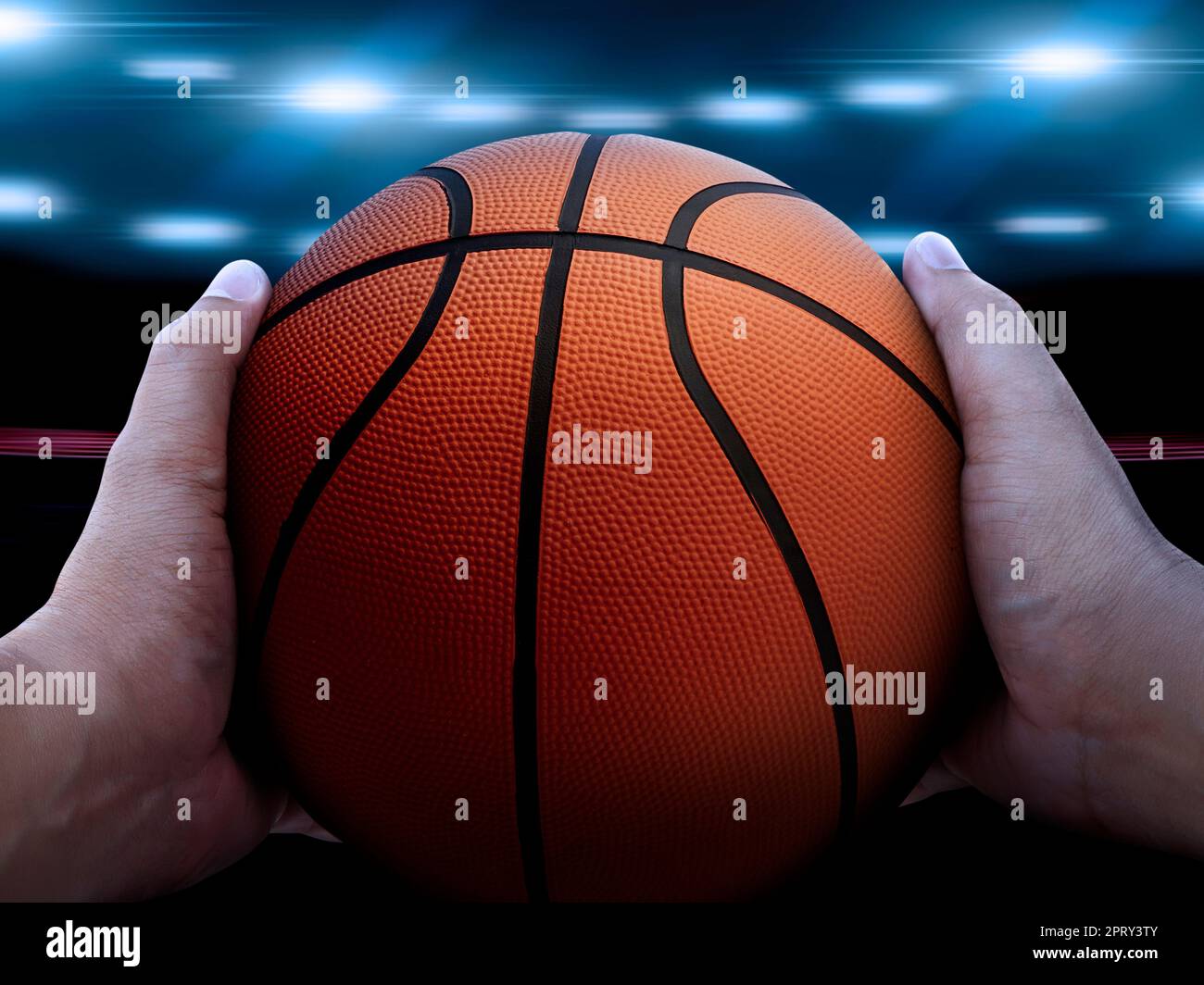 Basketball player with ball Stock Photo - Alamy